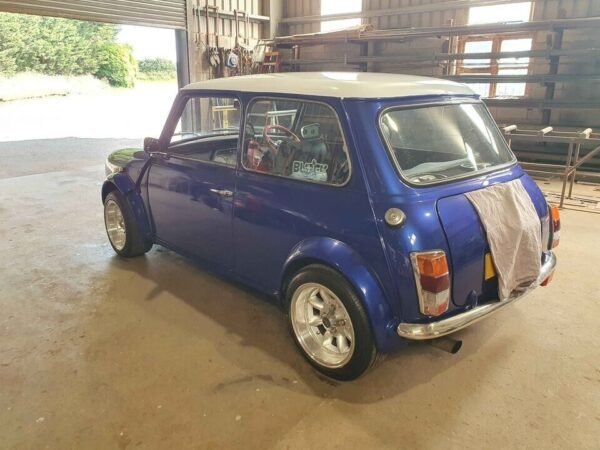 Classic Mini with Honda D16 twin cam conversion - MINI Trader